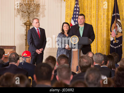 Sergeant Michael Verardo (right) speaks with his wife Sarah Verardo at ...