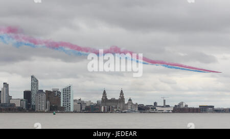 Liverpool, UK. 24th June 2017. The Red Arrows fly over the Liver ...