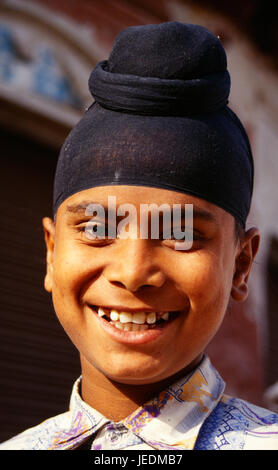 Young Sikh boy with hair tied up in bun, Punjab, India, Asia Stock ...