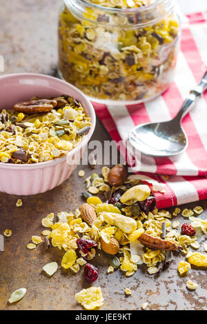 Homemade granola on a wooden table Stock Photo - Alamy
