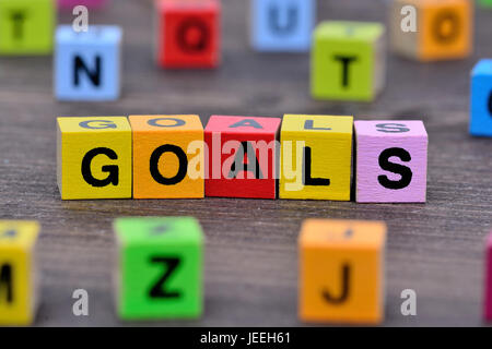 Goals word on wooden table Stock Photo - Alamy