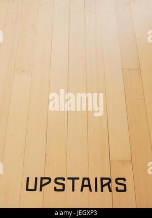 Upstairs signage on door Stock Photo - Alamy
