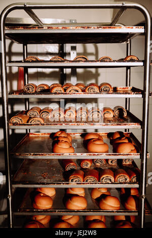 Tray of rolls on rack Stock Photo - Alamy