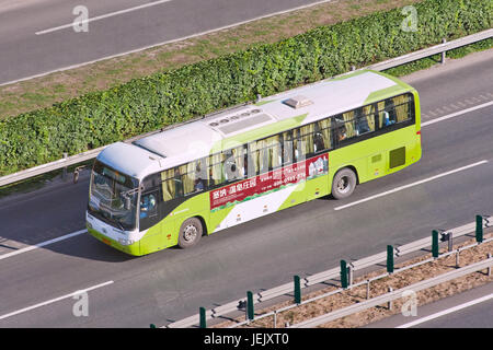 Advertising on a Bus Beijing China Stock Photo - Alamy