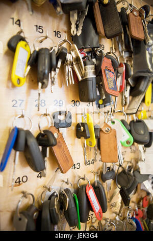 Car keys hanging on hooks Stock Photo - Alamy