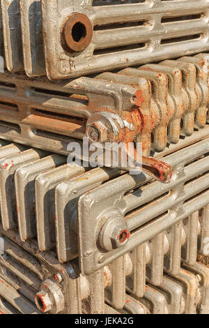Old and rusty radiators piled up in a junkyard Stock Photo - Alamy