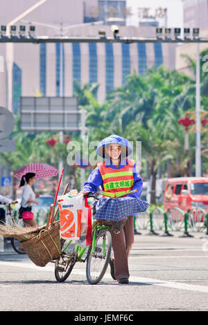 A Female Street Cleaner Working In The City Of Khiva, Uzbekistan Stock ...