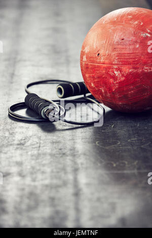 Ball and skipping rope in gym Stock Photo - Alamy