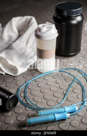 Supplements and rope on the floor Stock Photo - Alamy