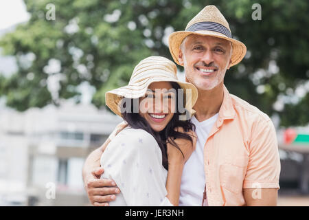 Young hispanic couple wearing casual clothes puffing cheeks with funny ...