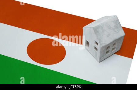 Small house on a flag - Niger Stock Photo - Alamy
