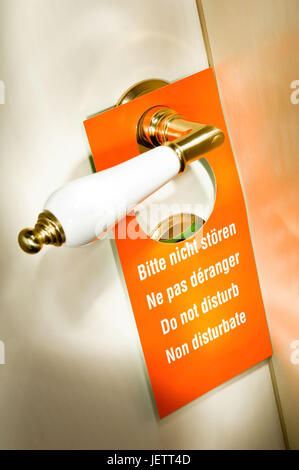 "Sign ""Request do not interfere"" in a white hotel room door with ...