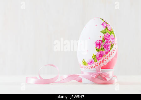 Hand painted decoupage Easter egg with flower and bird patterns, and a ...