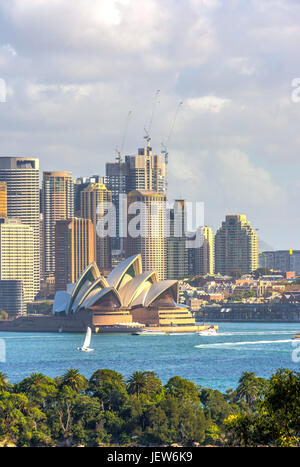 SYDNEY, AUSTRALIA - APRIL 24: Sydney skyline with old ferries, one of ...