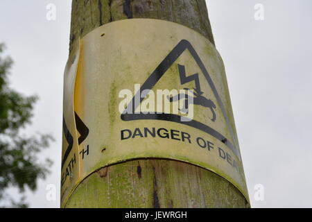 Yellow and Black Danger of Death Warning Sign Stock Photo - Alamy