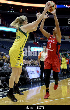 Seattle Storm guard Sami Whitcomb (32) dribbles against Phoenix Mercury ...