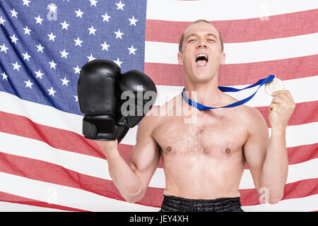 Excited boxer showing his gold medal Stock Photo - Alamy