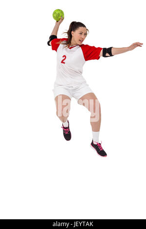 Sportswoman throwing a ball Stock Photo - Alamy