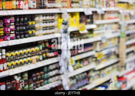 Side view of supermarket shelves Stock Photo - Alamy