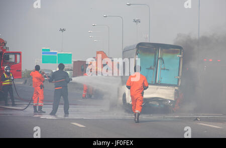 Firefighter fire brigade small truck car crash on motorway street, blur ...