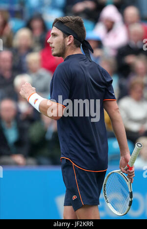 Great Britain's Cameron Norrie celebrates after winning a point during ...