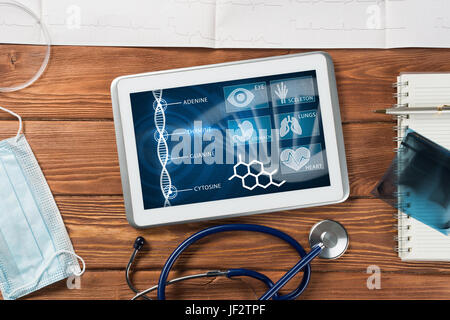 Tablet pc and medical tools Stock Photo - Alamy