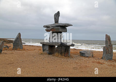 a inukshuk at the Hudson Bay near Churchill Stock Photo - Alamy