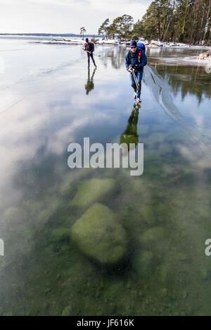 Men long-distance skating Stock Photo - Alamy