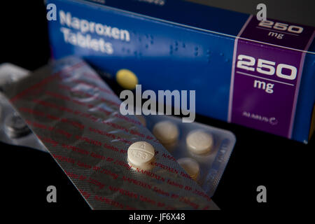 Naproxen pain and inflammation drug (NSAID) molecule. Blue skeletal ...