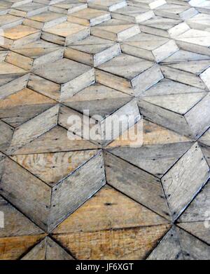 Old wooden floor parquet with diamond pattern as an antique background ...