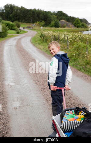 Children pulling cart on rural road, Greater Accra, Ghana, Africa Stock ...