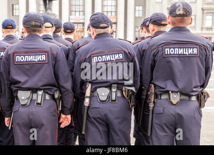 Russian police unit in uniform with police dogs on the Kuibyshev square ...