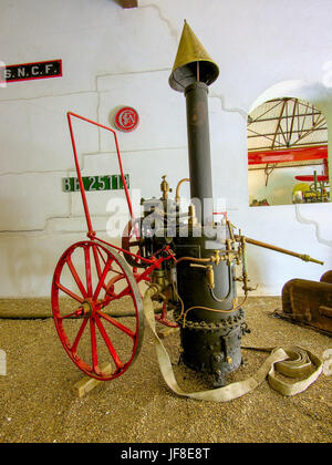 A vintage fire engine from the early 20th century being demonstrated at ...