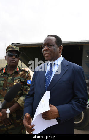 Ambassador Francisco Madeira and Maj. Gen. Mohamed Ahmed Jimaale shake ...