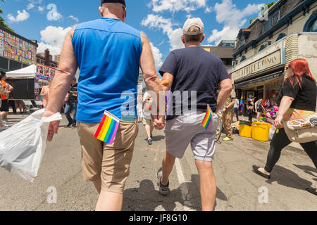 Toronto, CA - 24 June 2017: Gay Rainbow Flag painted on asphalt in ...