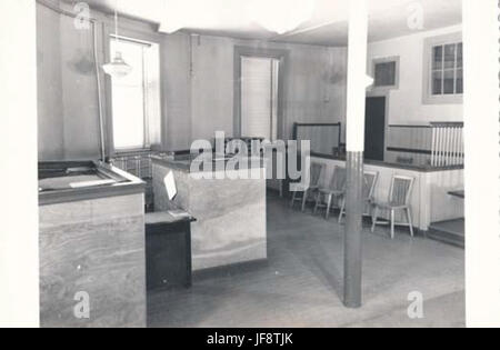 A historical photograph capturing the interior of a courtroom in Sarnia ...