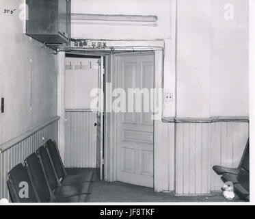 A historic photograph of a courtroom in Sarnia, Ontario, depicting the ...