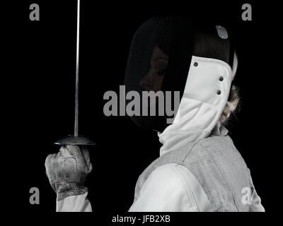 Portrait of woman fencer holding rapier. Olympic sports, martial arts ...