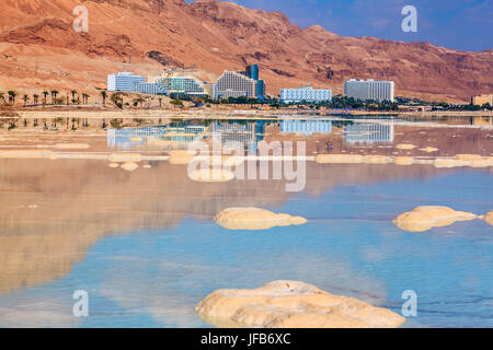 The evaporated salt forms freakish patterns on a water surface. The ...