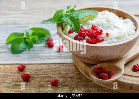 Traditional rice porridge on milk with apples Stock Photo - Alamy