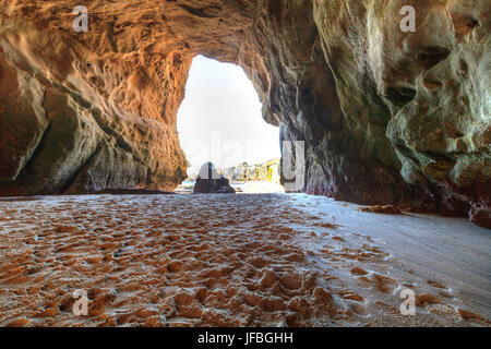 Open cave at One Thousand Steps Beach Stock Photo - Alamy