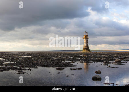 Whitford Point lighthouse at low tide on the Gower Peninsular, South ...