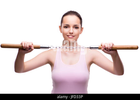 Young woman with nunchucks isolated on white Stock Photo - Alamy