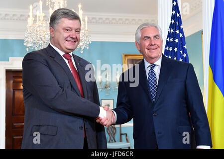 The Ukrainian President Petro Poroshenko shake hand with the public ...