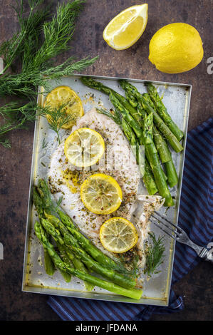 Coalfish Filet with Green Asparagus Stock Photo - Alamy