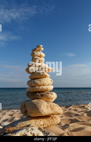 stone piles on the beach Stock Photo - Alamy