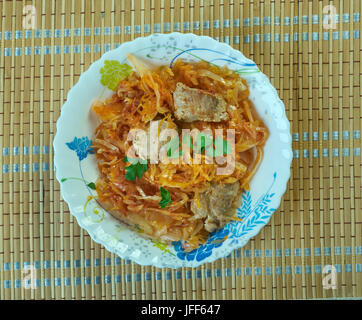 Traditional fresh and healthy sour turnip in glass jar on wooden ...