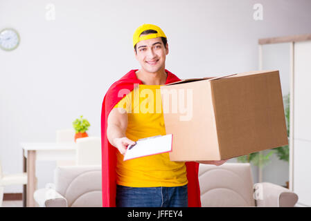 The superhero delivery guy with box Stock Photo - Alamy