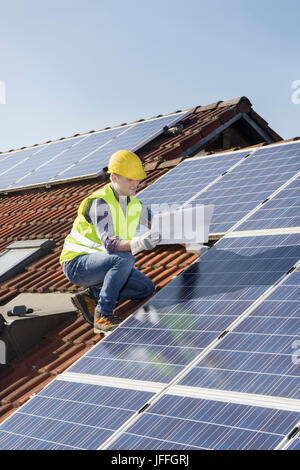 Solar panel station, Engineer installing solar panel at solar energy ...