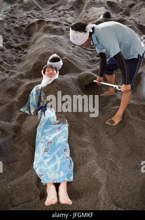 Japan, Kyushu Island, city of Ibusuki, hot sand bath on the beach Stock ...